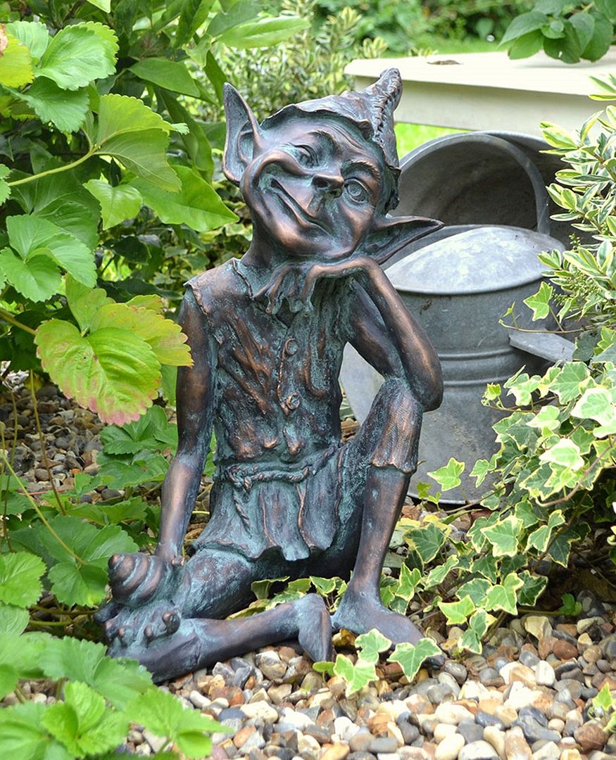 Charming and fun Pixie sitting Garden Ornament - bronze effect resin ...
